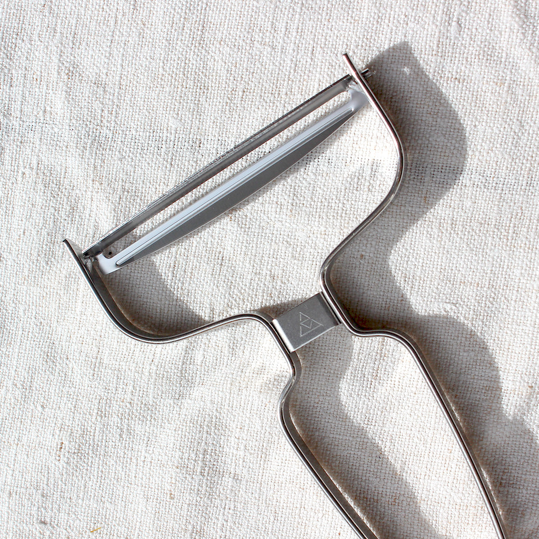 Grand économe castor en inox